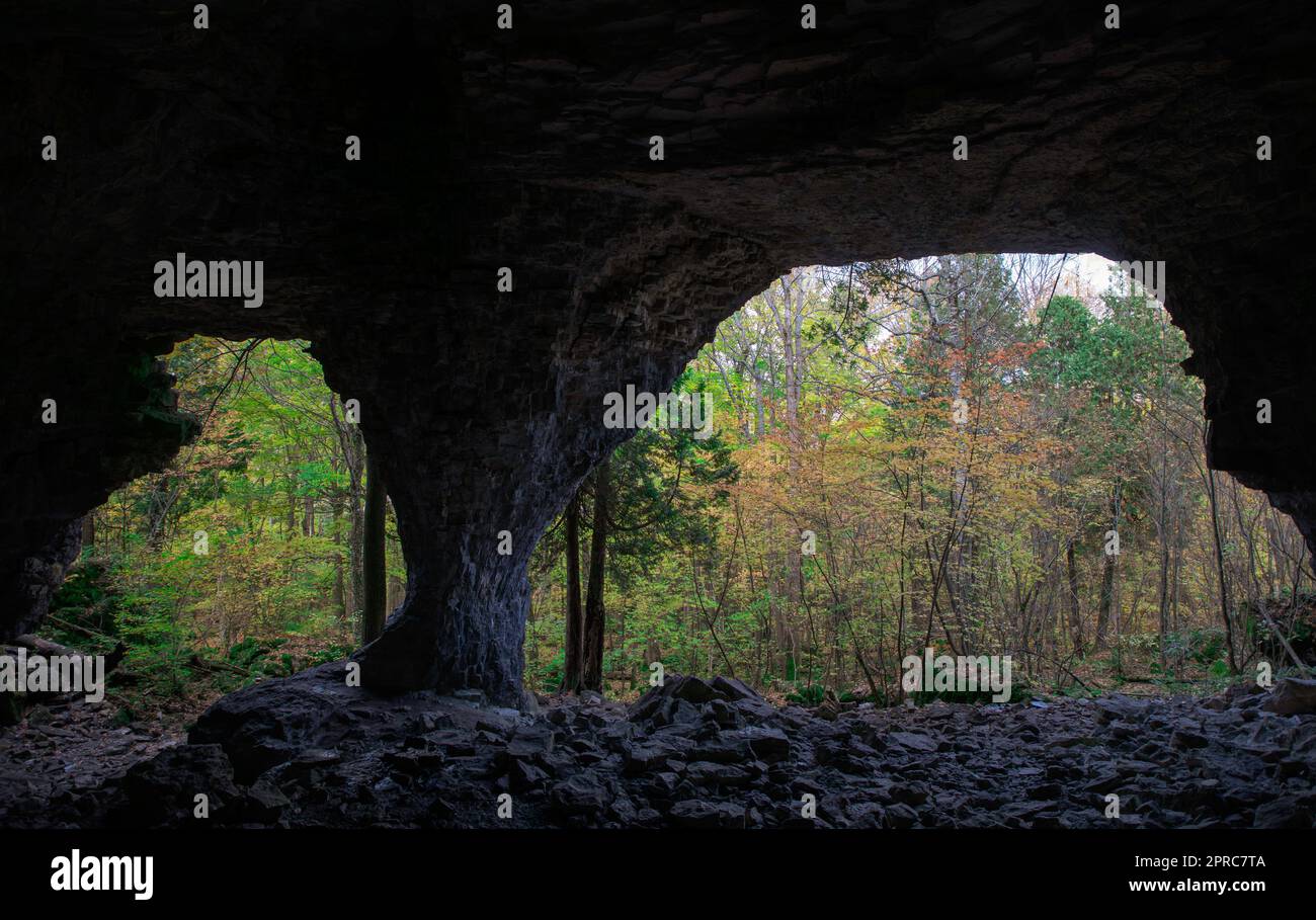 A cave in rock face hi-res stock photography and images - Alamy