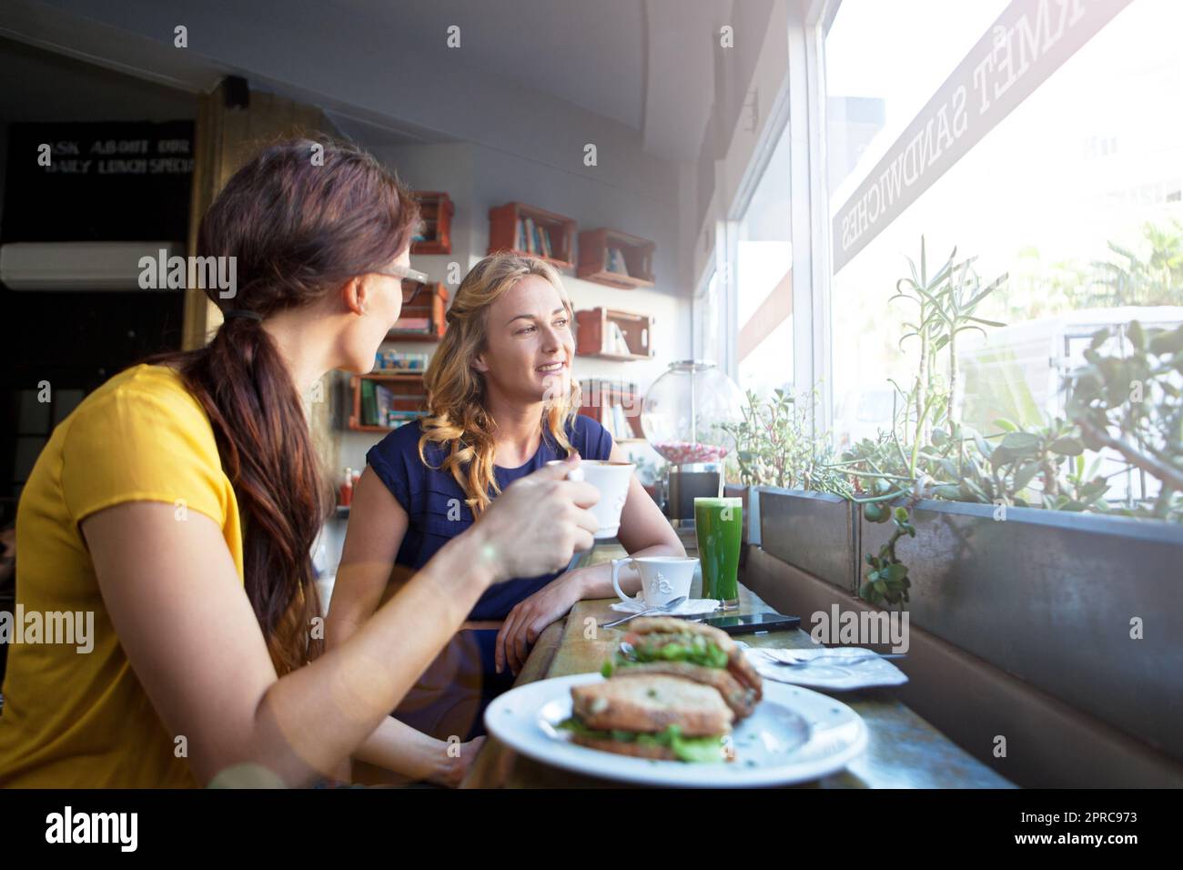 Lunch with the ladies. girlfriends in a coffee shop Stock Photo - Alamy