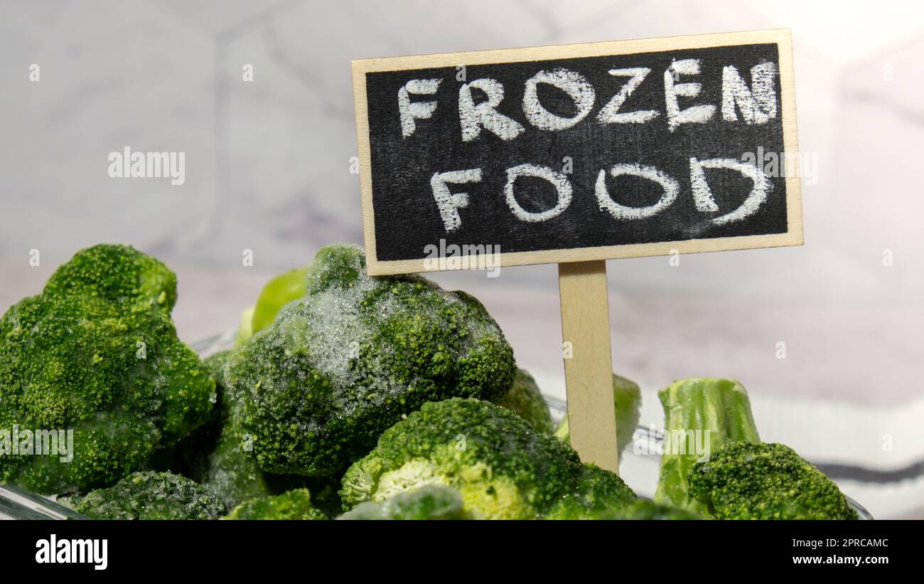 Frozen food broccoli florets with blackboard label and text FROZEN FOOD ...