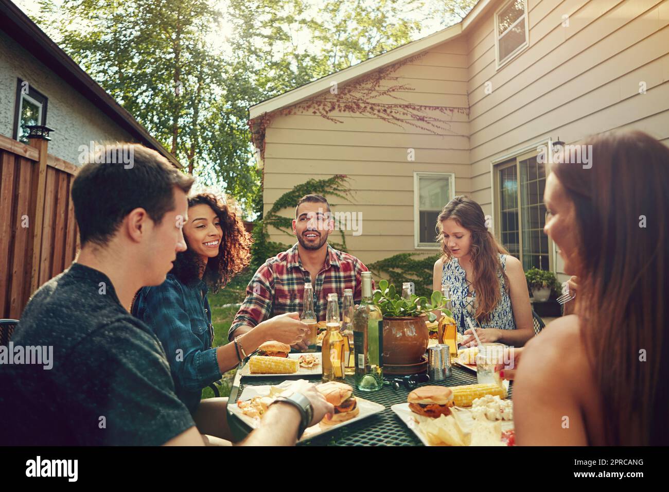 Good food with great friends. a group of friends having lunch in their ...