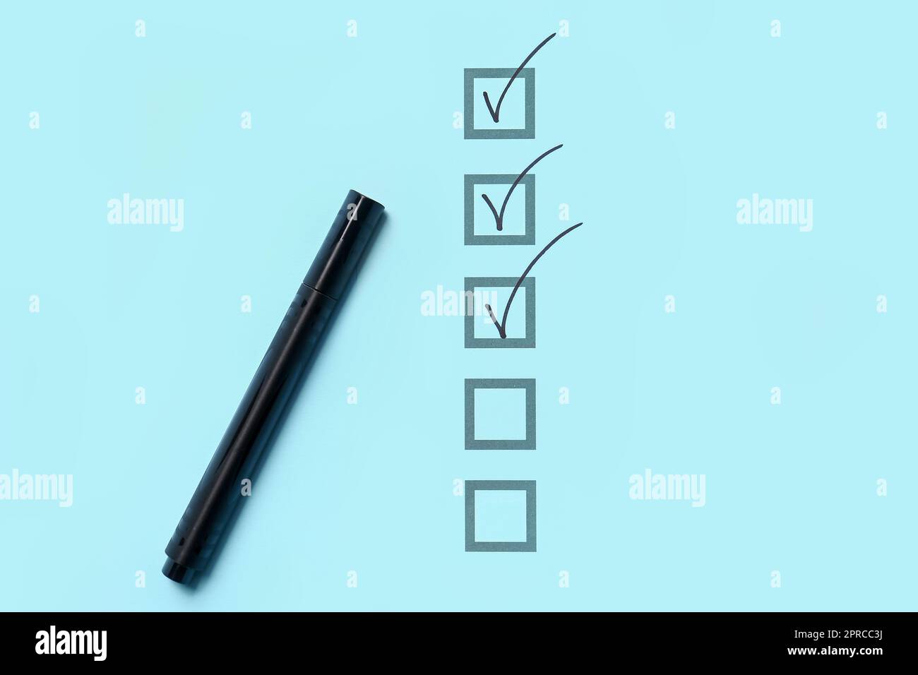 Checklist box with black marker, closeup Stock Photo - Alamy