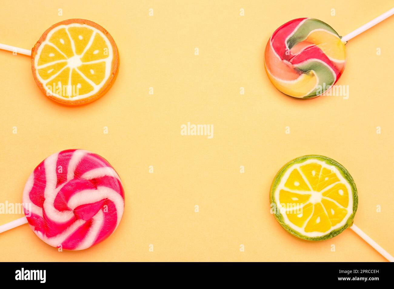 Frame made sweet lollipops hi-res stock photography and images - Alamy