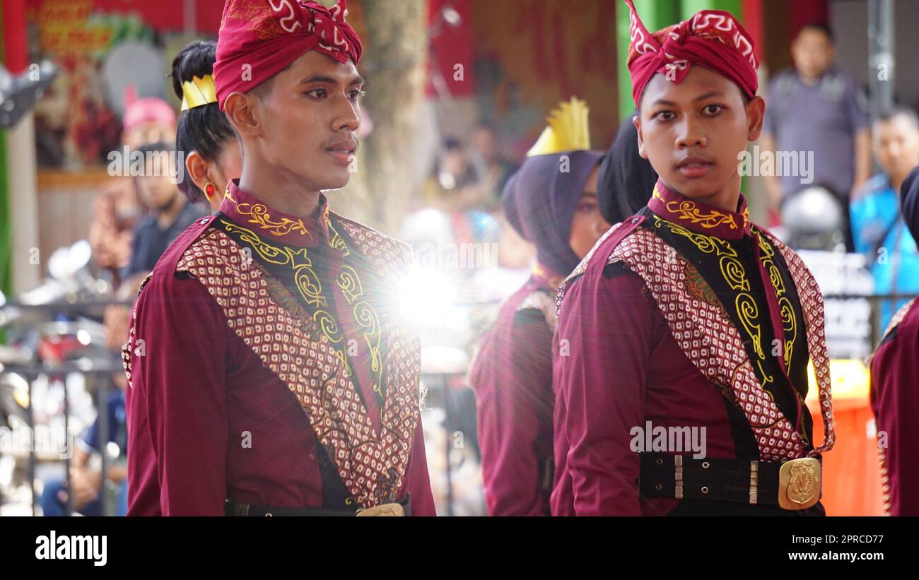 Indonesian senior high school students with batik uniforms, marching to ...