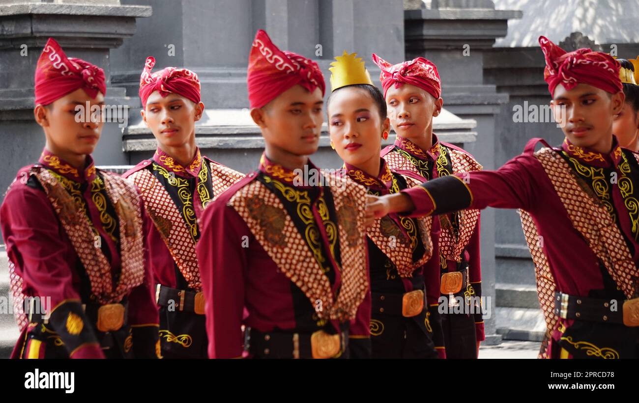 Indonesian senior high school students with batik uniforms, marching to ...