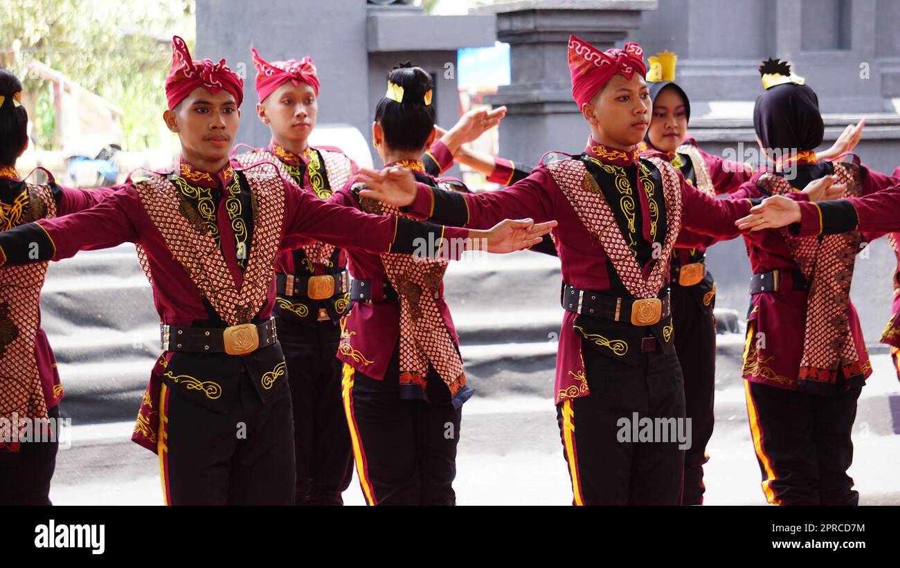 Indonesian senior high school students with batik uniforms, marching to ...