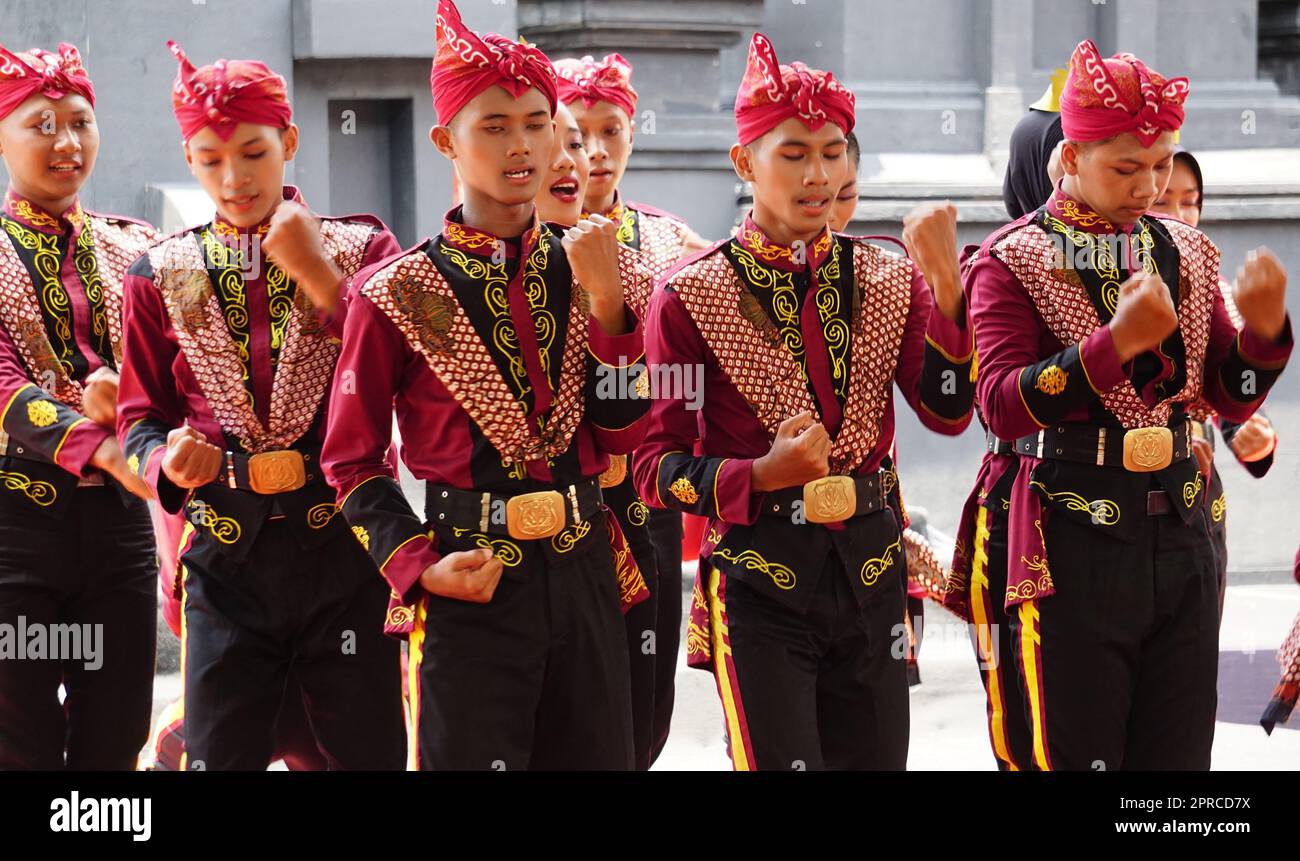 Indonesian senior high school students with batik uniforms, marching to ...