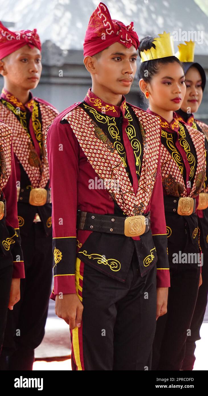 Indonesian senior high school students with batik uniforms, marching to ...