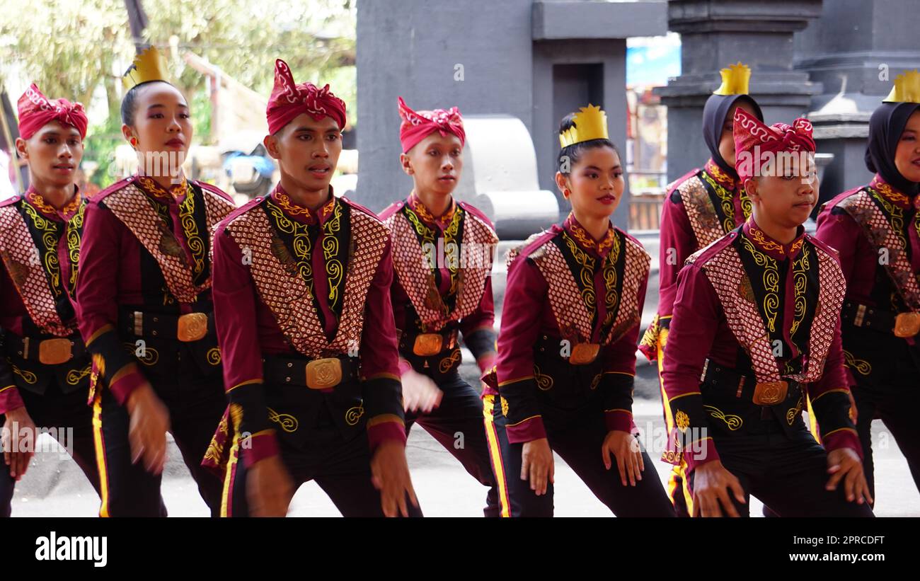 Indonesian senior high school students with batik uniforms, marching to ...
