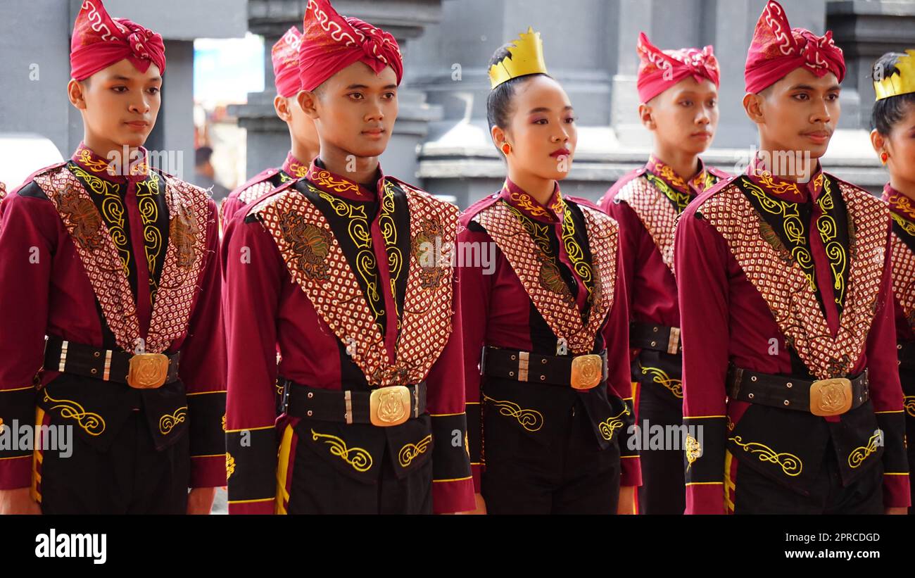 Indonesian senior high school students with batik uniforms, marching to ...