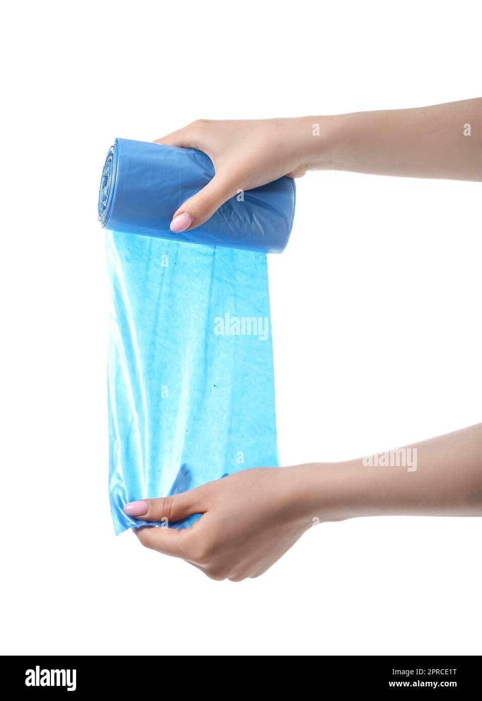 Female hands holding roll of garbage bags isolated on white background ...
