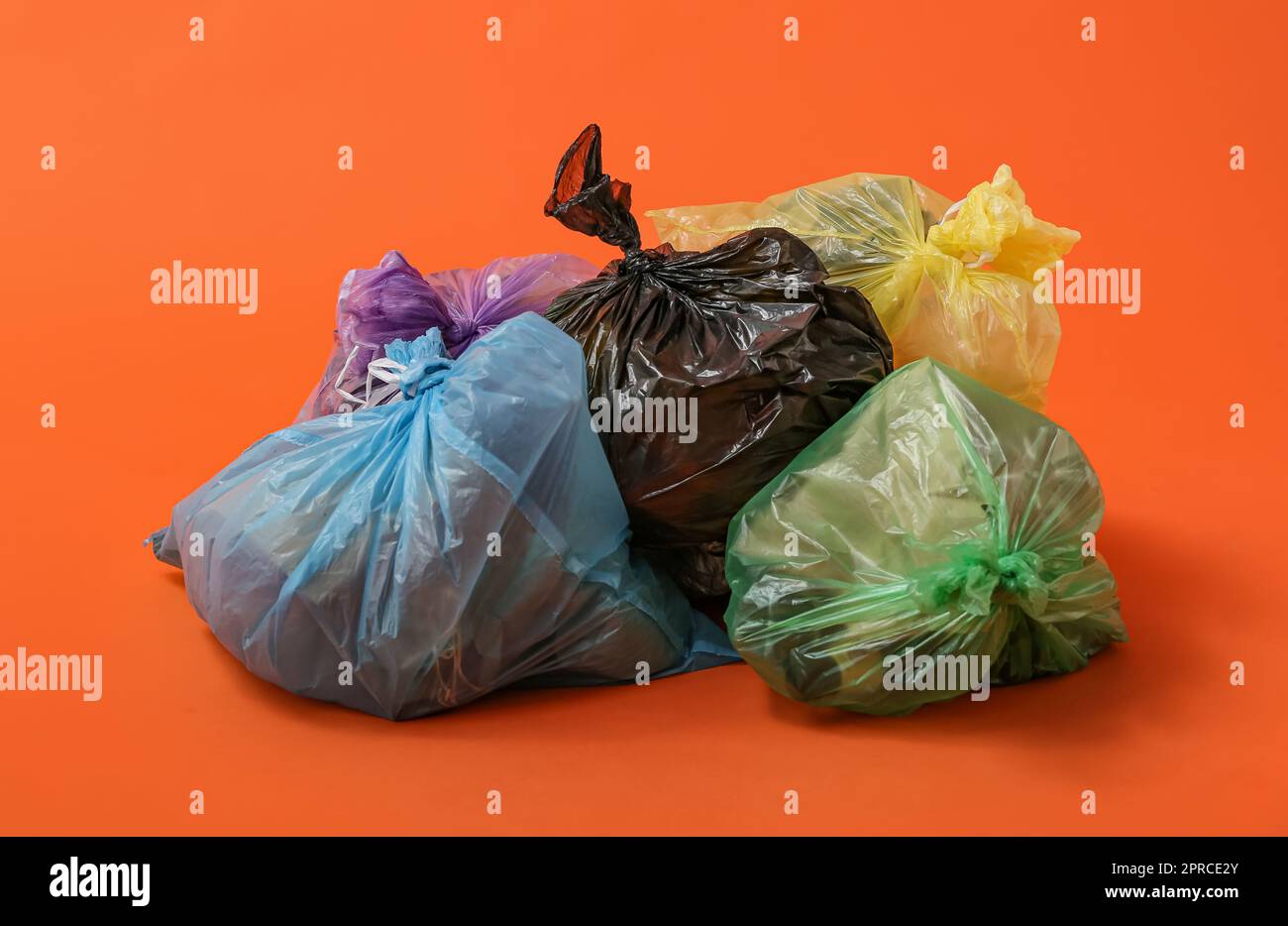 Orange rubbish bags hi-res stock photography and images - Alamy