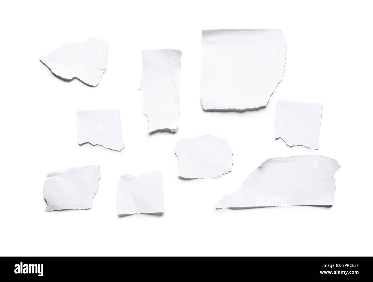Torn pieces of paper isolated on white background Stock Photo - Alamy