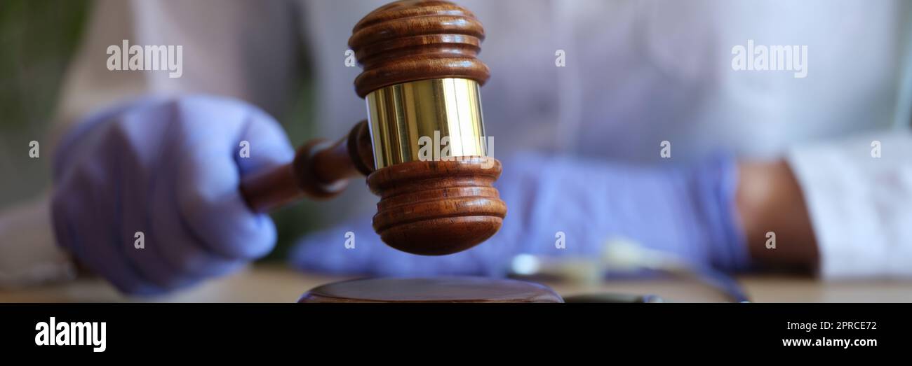 Female doctor with judge gavel and medical stethoscope Stock Photo - Alamy