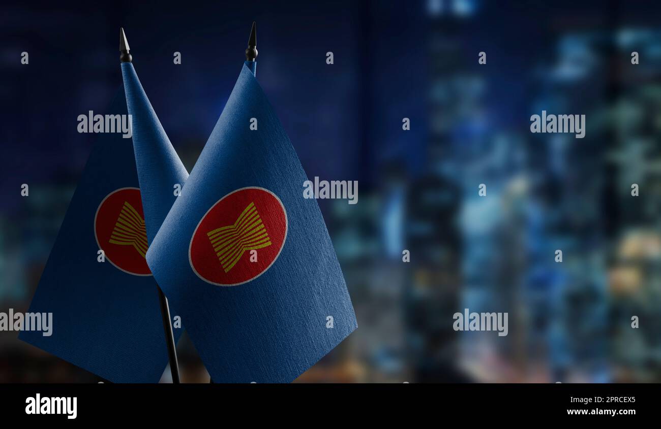 Small flags of the ASEAN on an abstract blurry background Stock Photo ...