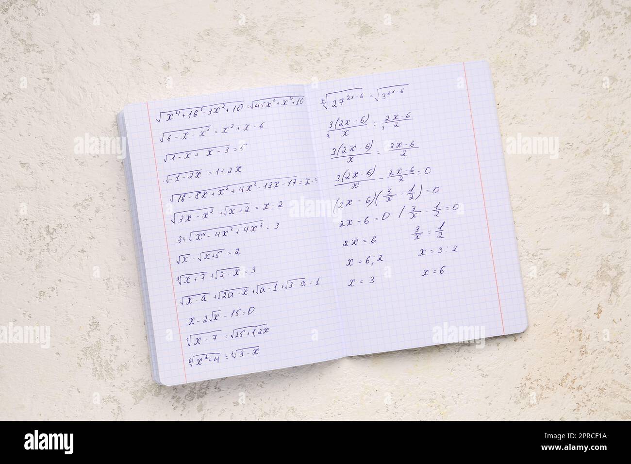Copybook with maths formulas on white grunge background Stock Photo - Alamy