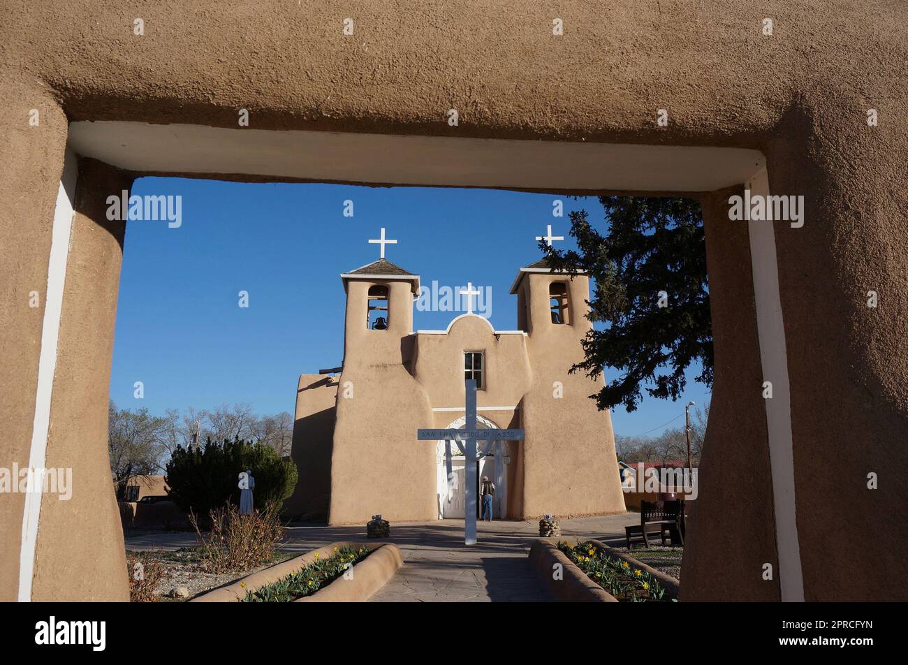 Mass goers enter the San Francisco de Asís Mission Church located in ...