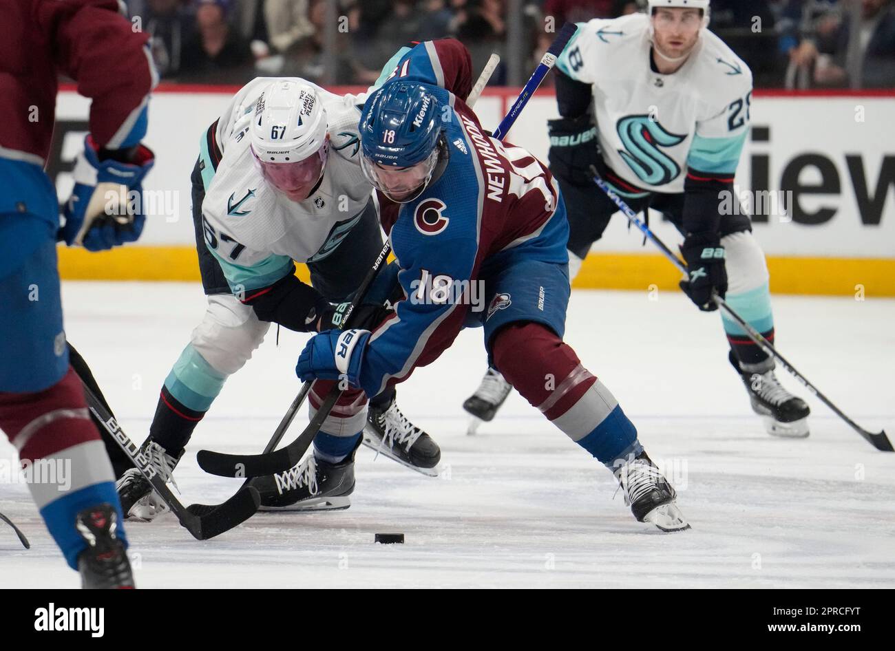 Seattle Kraken center Morgan Geekie, left, and Colorado Avalanche ...