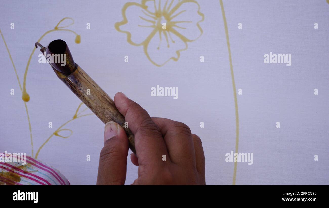 The process of making batik on Festival Batik Keren Blitar. Batik is a ...