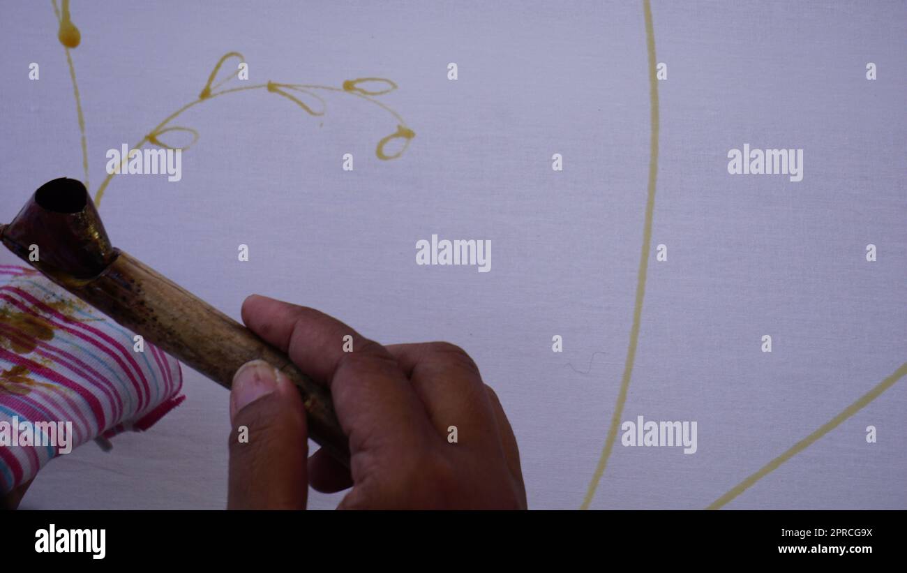 The process of making batik on Festival Batik Keren Blitar. Batik is a ...