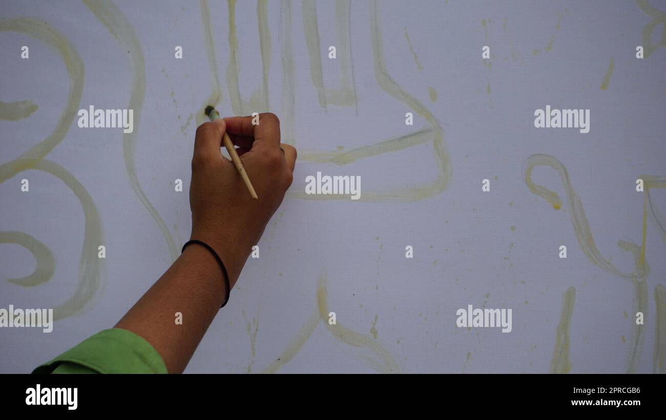 The process of making batik on Festival Batik Keren Blitar. Batik is a ...