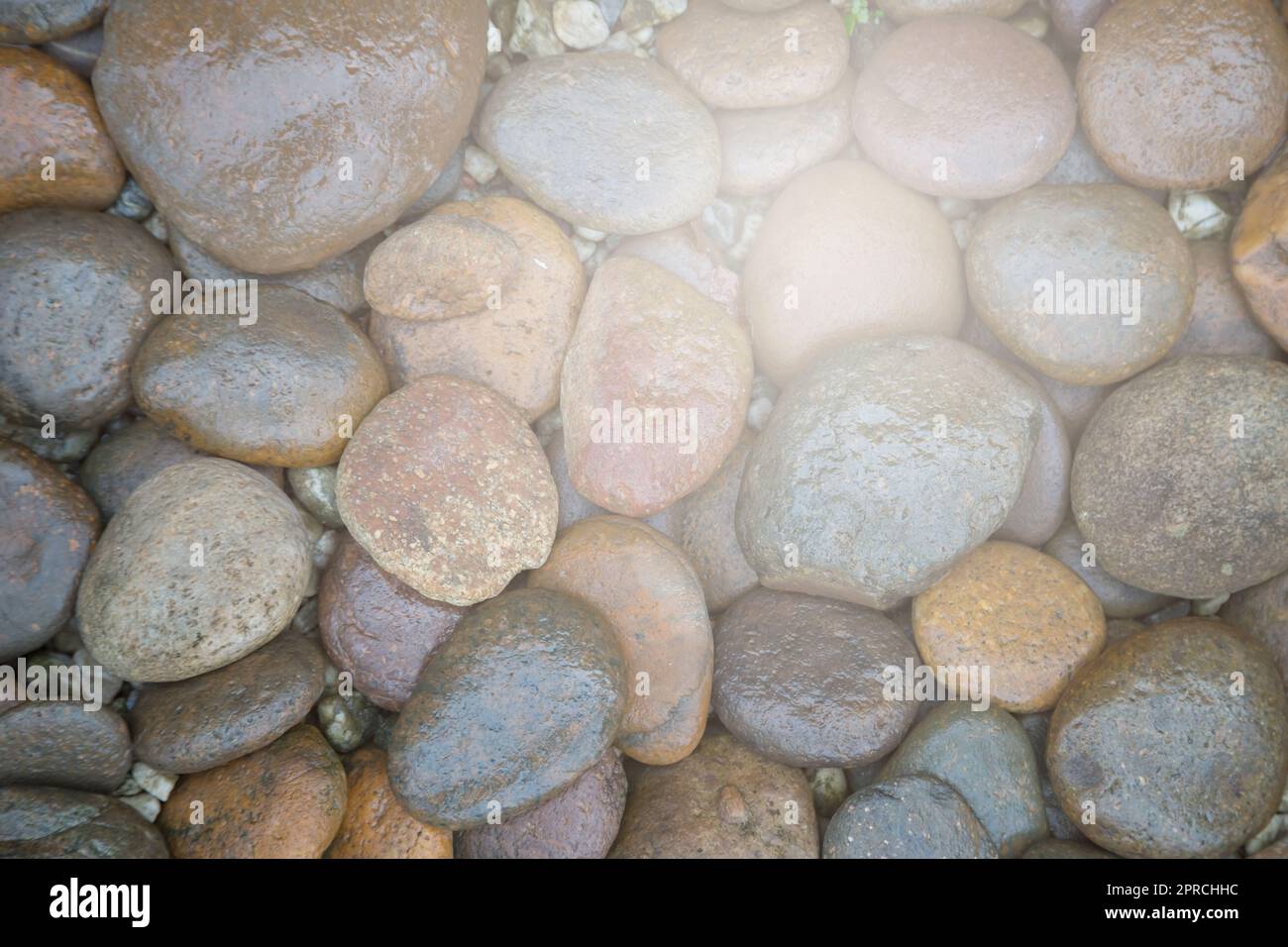 Wet rock river texture background Stock Photo - Alamy