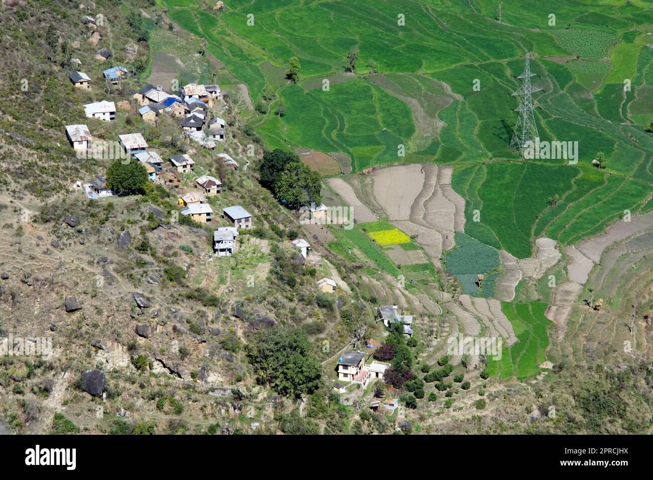 Aerial view of a Himalayan village and terrace farming field in state ...