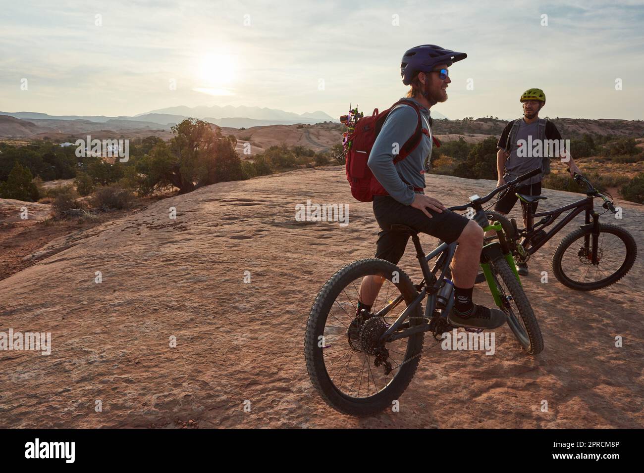 Just grab your bike and go on an adventure. Full length shot of two men ...