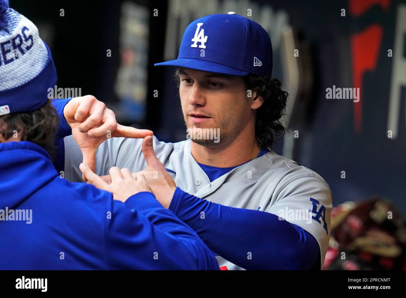 Los Angeles Dodgers' James Outman walks in the dugout before the team's ...