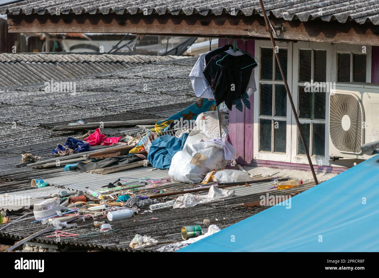 A mess on the roof of the family house Stock Photo - Alamy