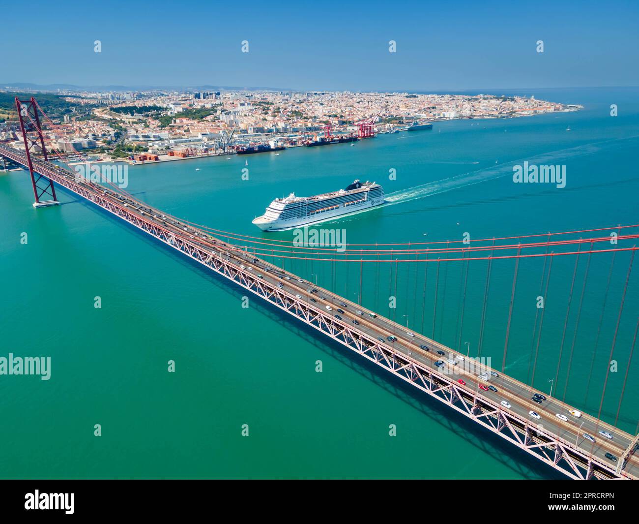 An aerial view of the 25 de Abril Bridge (Portuguese: Ponte 25 de Abril ...
