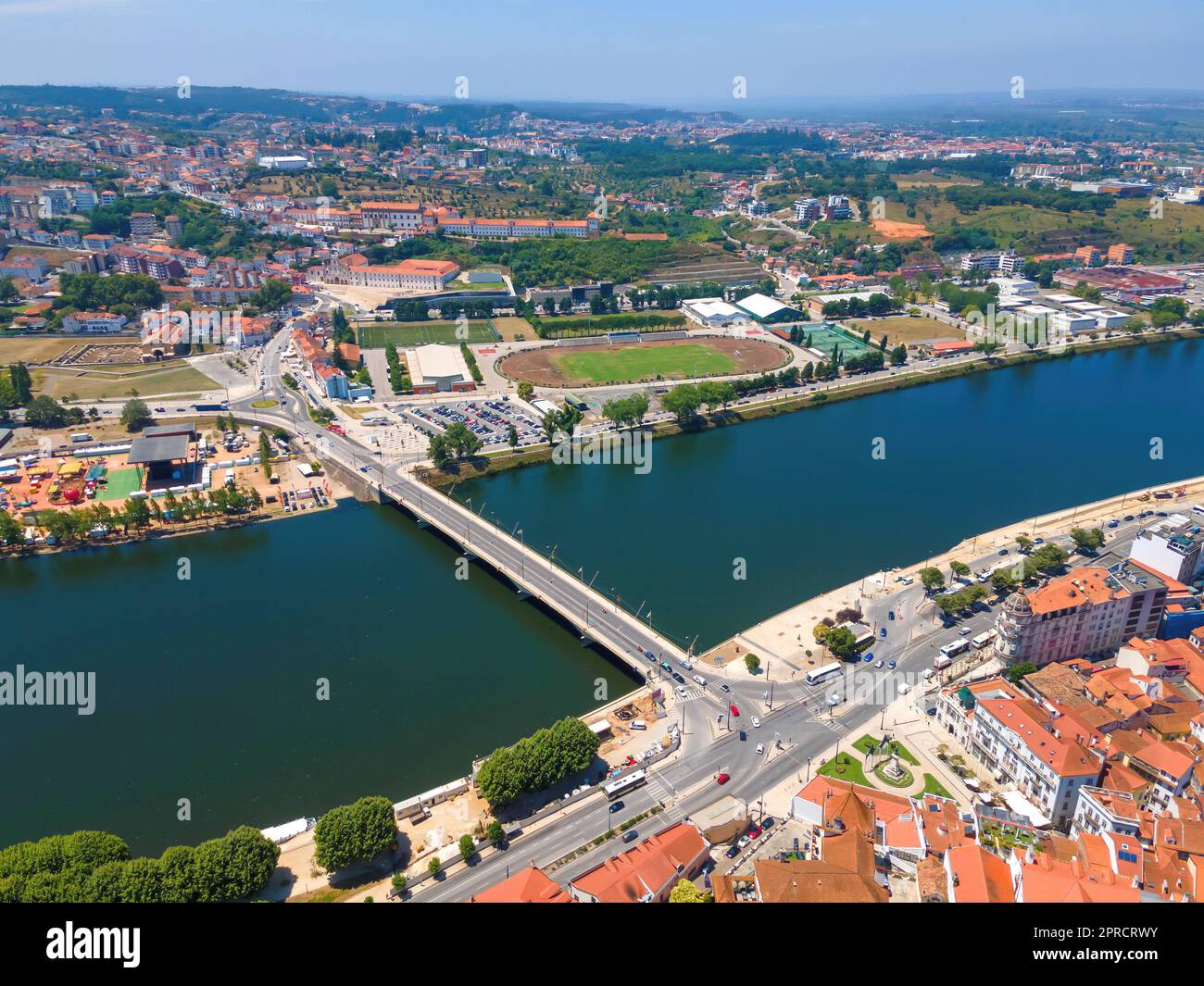 An aerial view of Santa Clara Bridge over Mondego River in Coimbra ...
