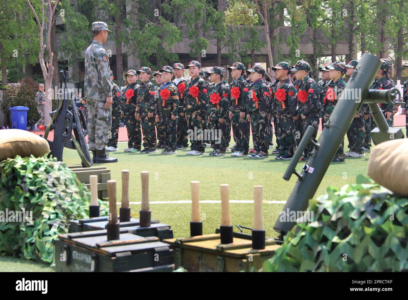 LIANYUNGANG, CHINA - APRIL 27, 2023 - Children learn military poses ...