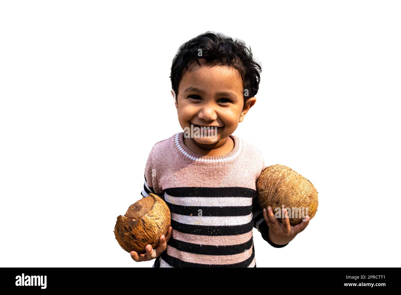 Cute Asian little boy holding two coconuts to drink water with his ...