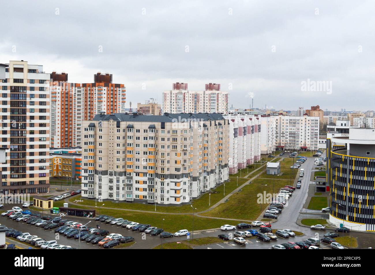 Top view of a large modern city with houses, multi-storey buildings and ...
