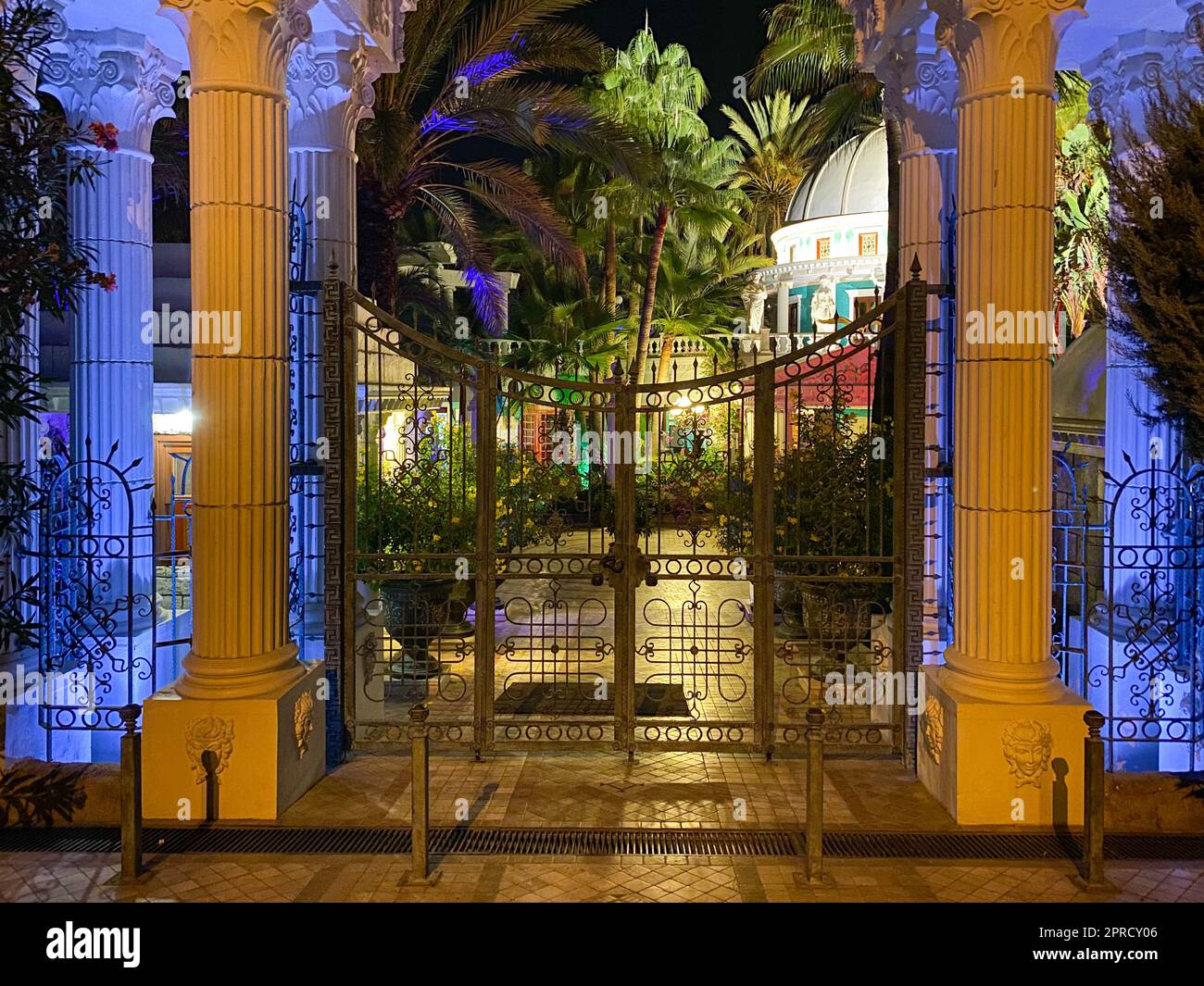 Large gates with stone columns in Greek and Roman antique style at ...