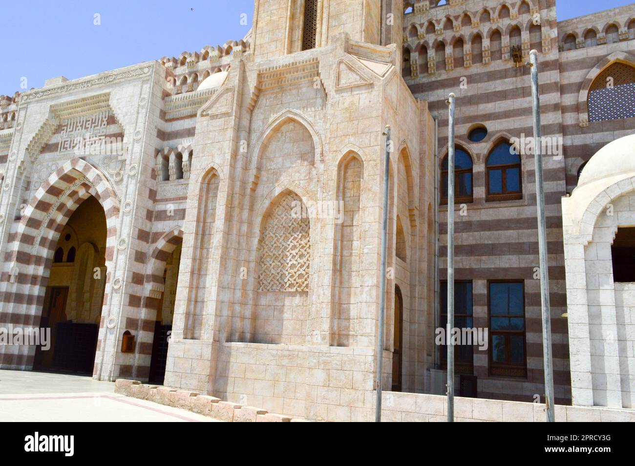 A wall with a beautiful texture of a Muslim Islamic Arab mosque made of ...