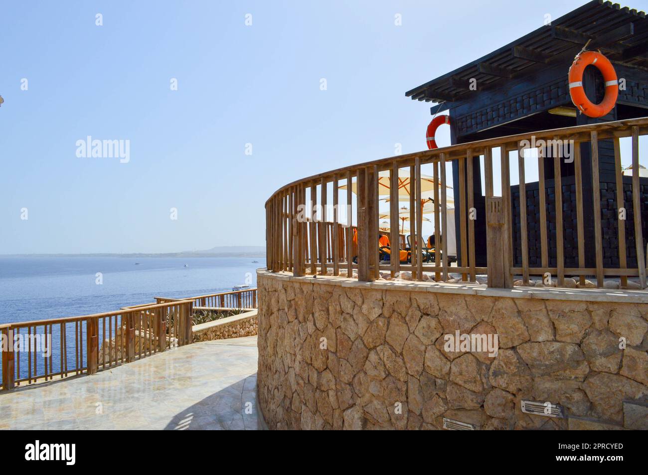 A stone rescue tower, a lifeguard post with a view of the sea from a ...