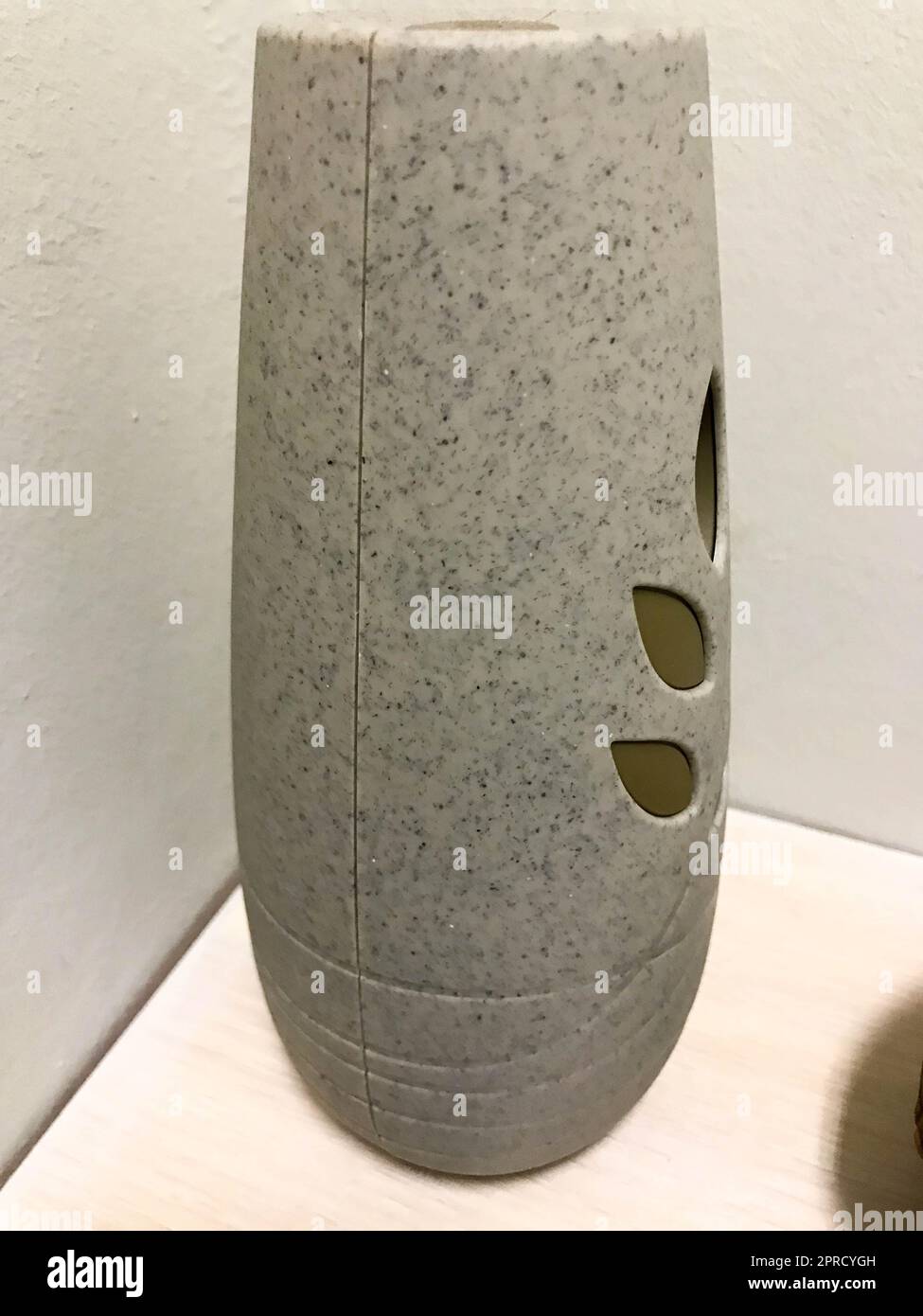 Gray plastic automatic air freshener oval for a tasty pleasant fresh ...