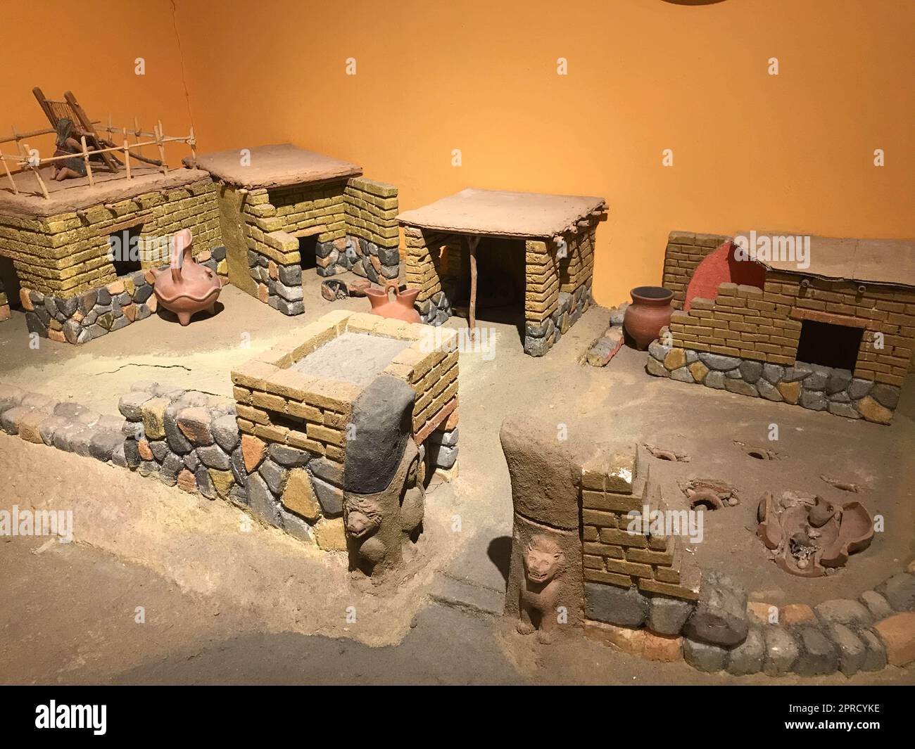 A small clay model of an ancient building in a museum Stock Photo - Alamy