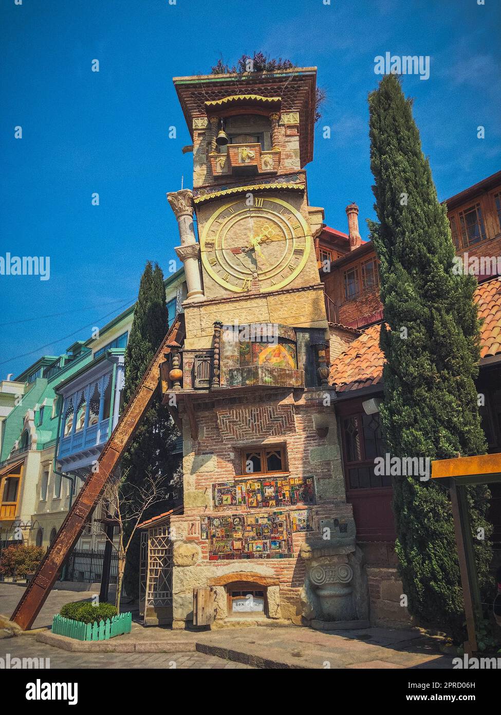 Old stone ancient carved beautiful antique European clock tower with ...