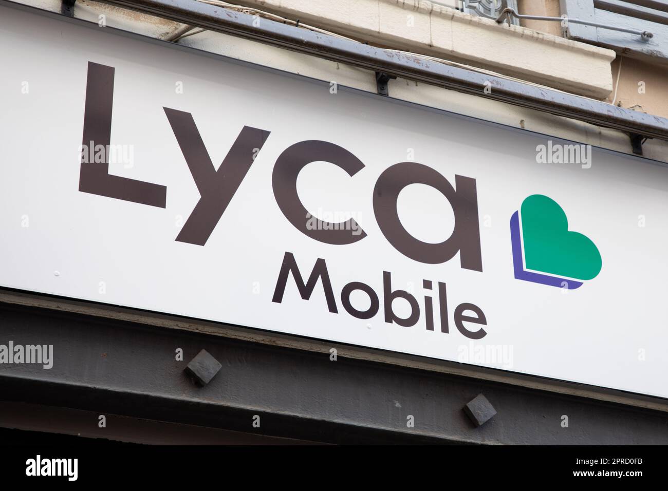 lyon , Aura France - 04 24 2023 : Lyca mobile logo text and brand sign facade entrance store ...