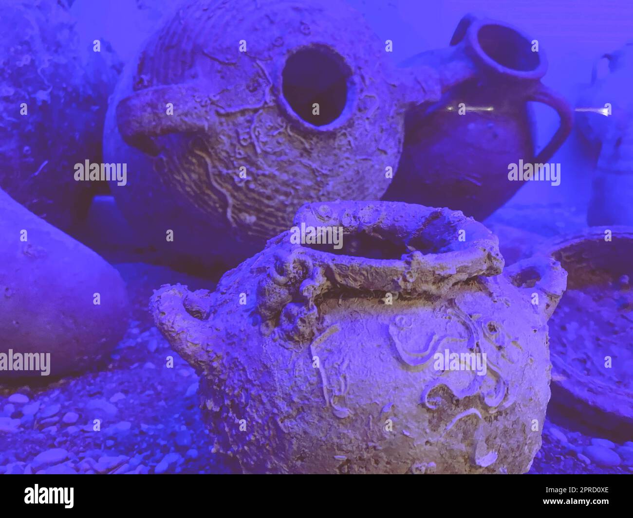 two decorative jugs underwater, sea world. decorative ware of the ...