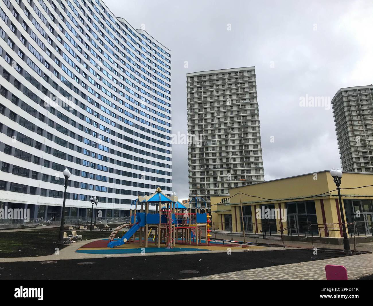 urban landscape, high-rise apartment buildings in blue and white. next ...