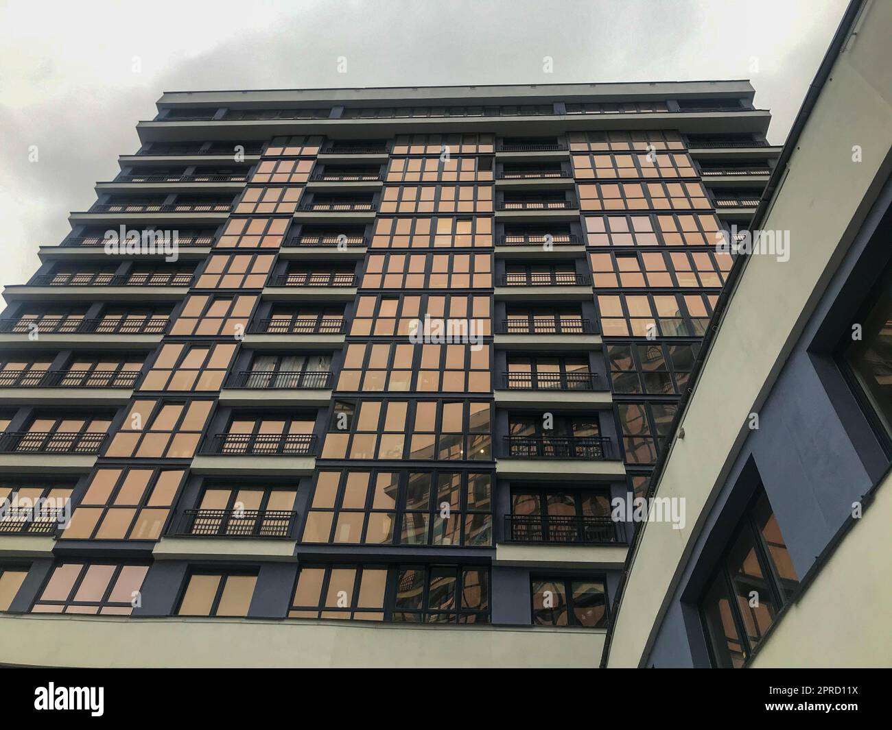 residential building, high, with frosted windows in the center of the ...