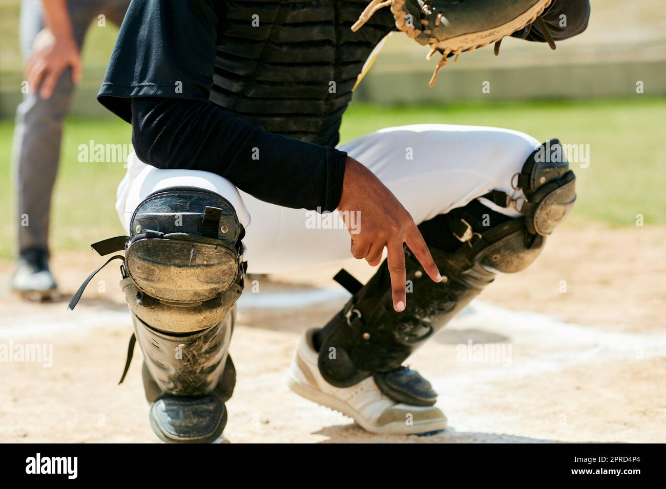 Keeping the peace in the game. an unrecognizable baseball player ...