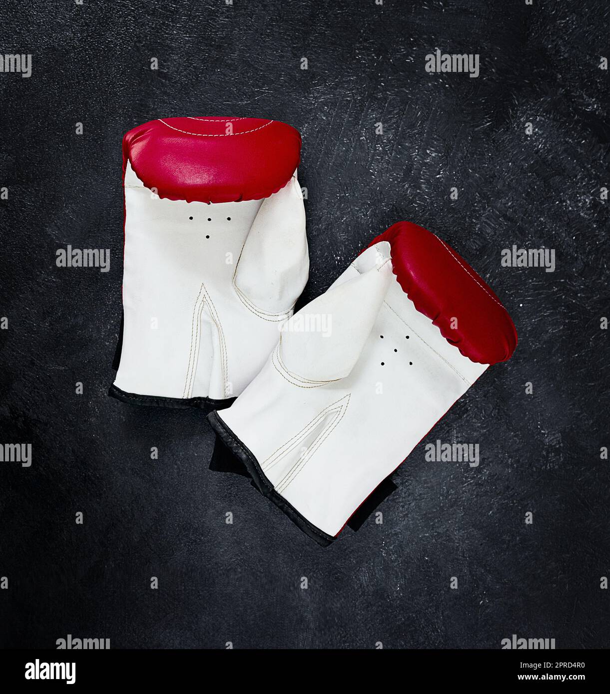 You want to fight me. High angle shot of a pair of boxing gloves placed ...