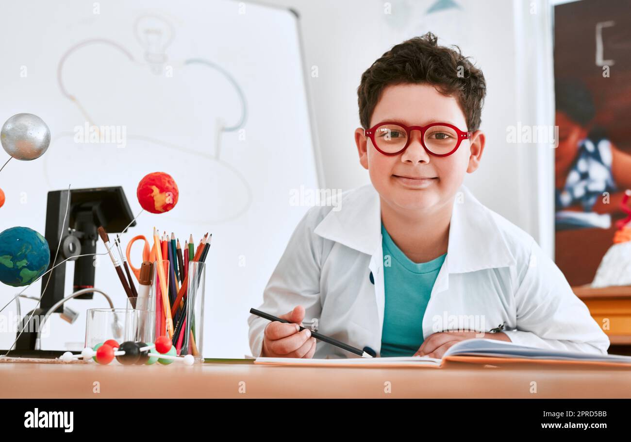 Boy writing notes hi-res stock photography and images - Alamy