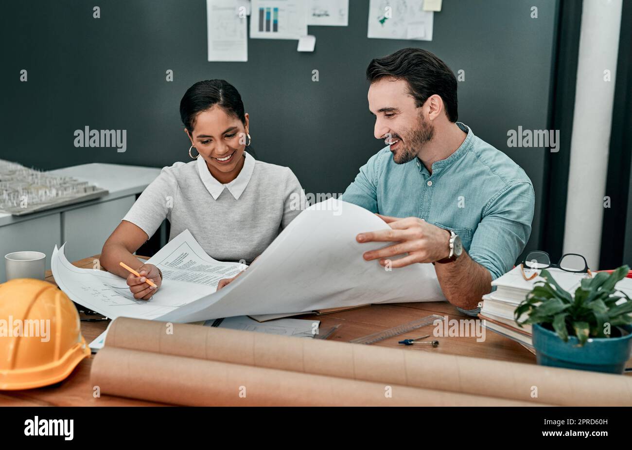 Two architects working blueprints hi-res stock photography and images - Alamy