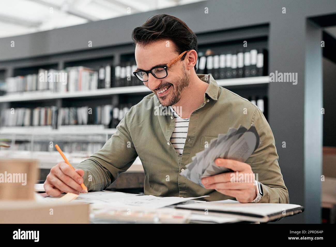 Im too good at this job. a handsome young male architect smiling while ...