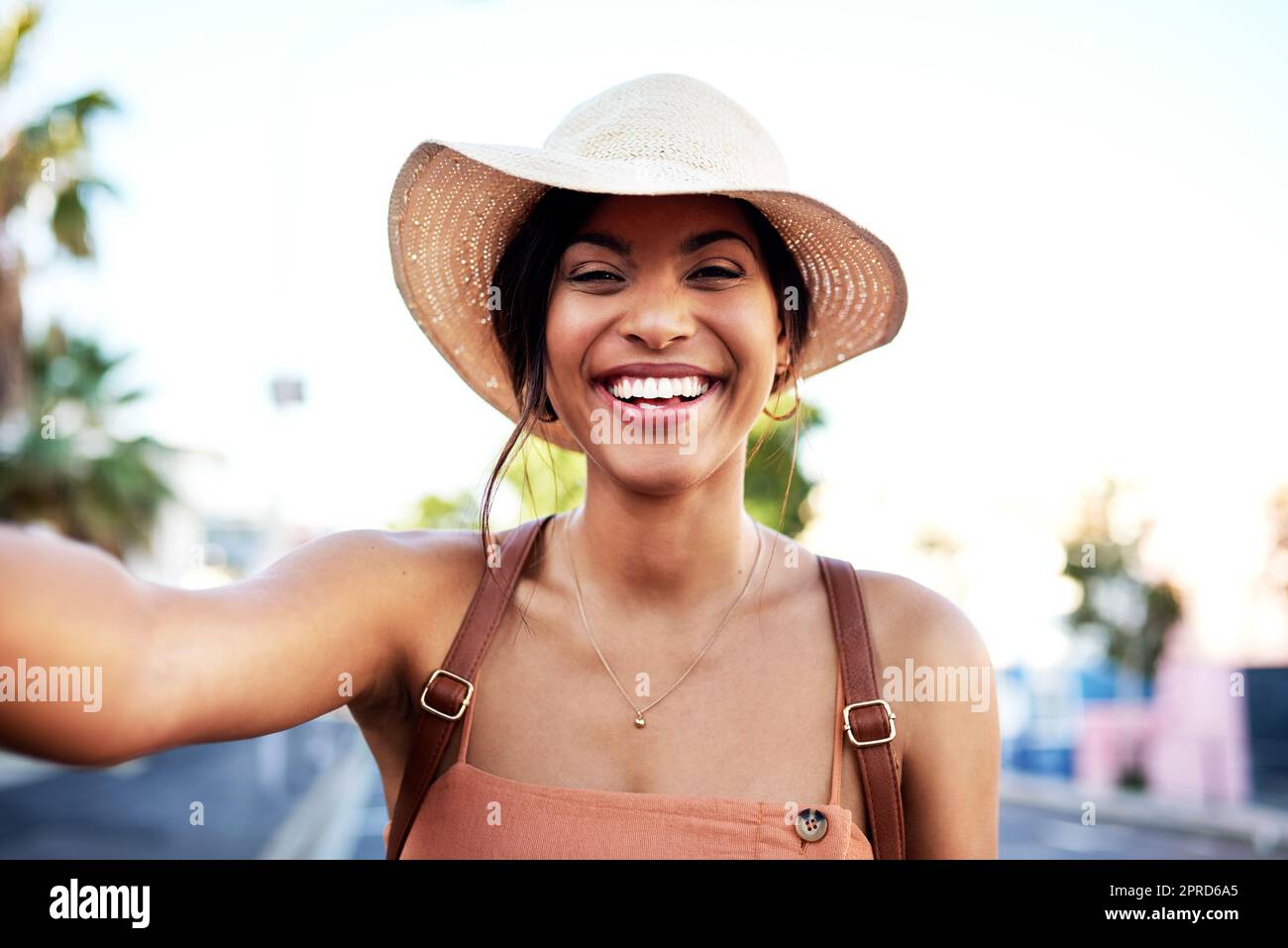 I hope everyone can see how happy I am. Portrait of an attractive young woman taking selfies ...